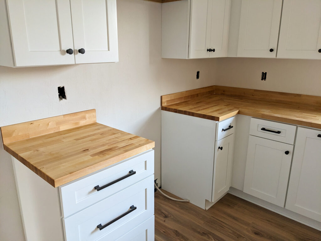 Kitchen install with butcher block countertops – Syzygy Woodworks