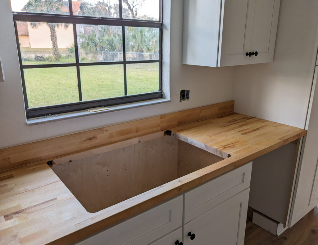 Kitchen install with butcher block countertops – Syzygy Woodworks