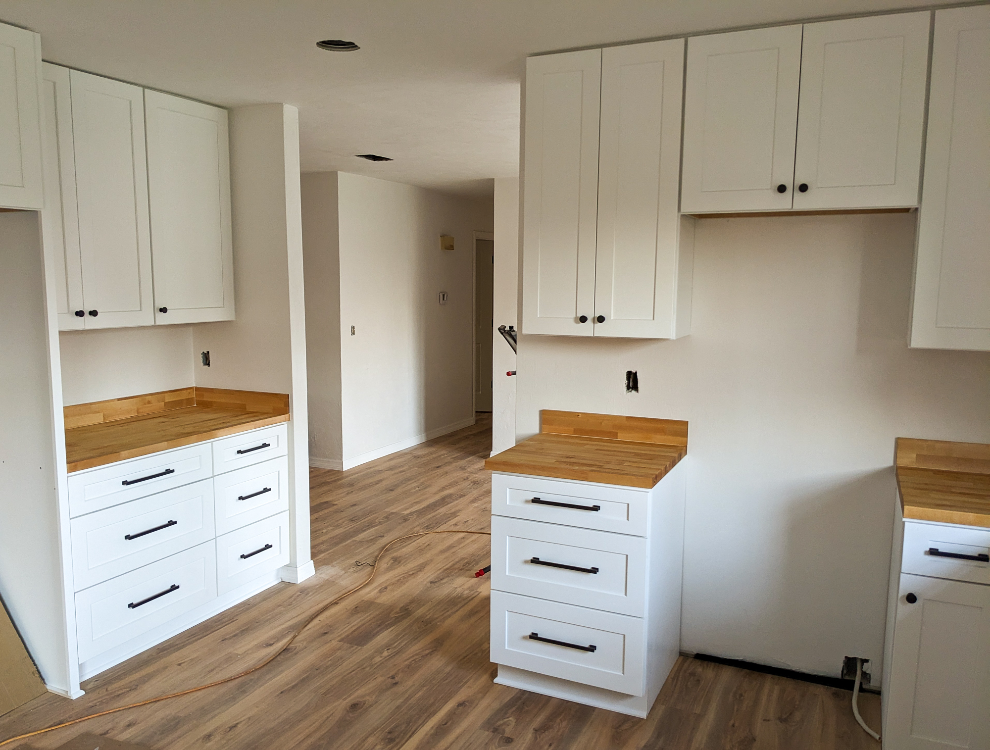 Kitchen install with butcher block countertops – Syzygy Woodworks